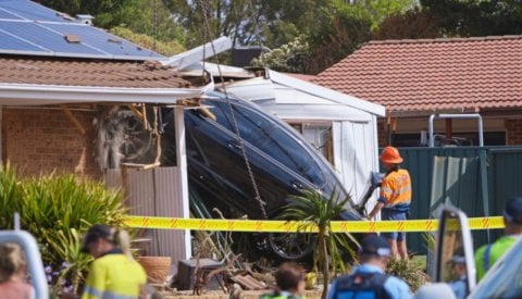 Three teen girls injured after stolen car rolls into Brisbane family home