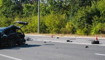 Mother charged after 6-year-old girl dies in crash with dump truck