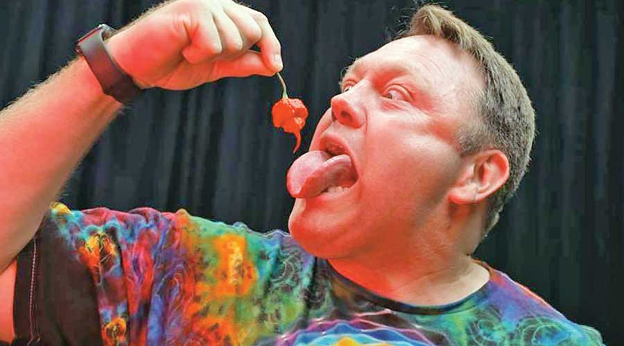 California man sets Guinness World Record for eating 10 Carolina reaper ...