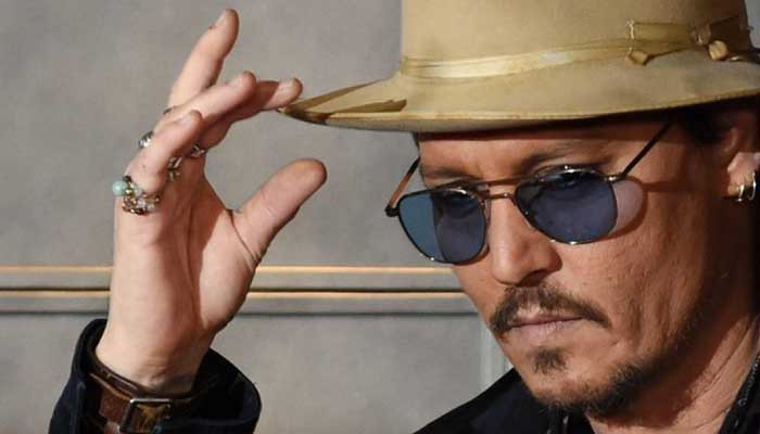Johnny Depp bursts into tears on receiving seven-minute standing ...