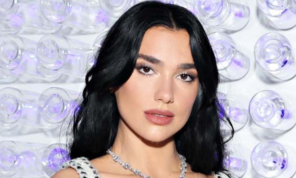 Dua Lipa embraces Barbiecore trend with pink mini dress and thigh-high ...