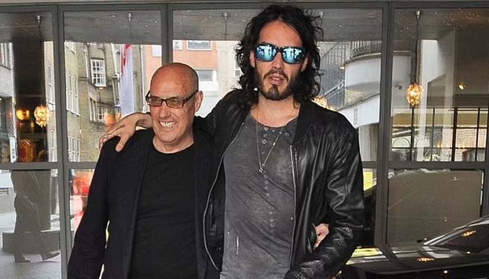 Russell Brand's father Ron Brand defends his son, questions media ...